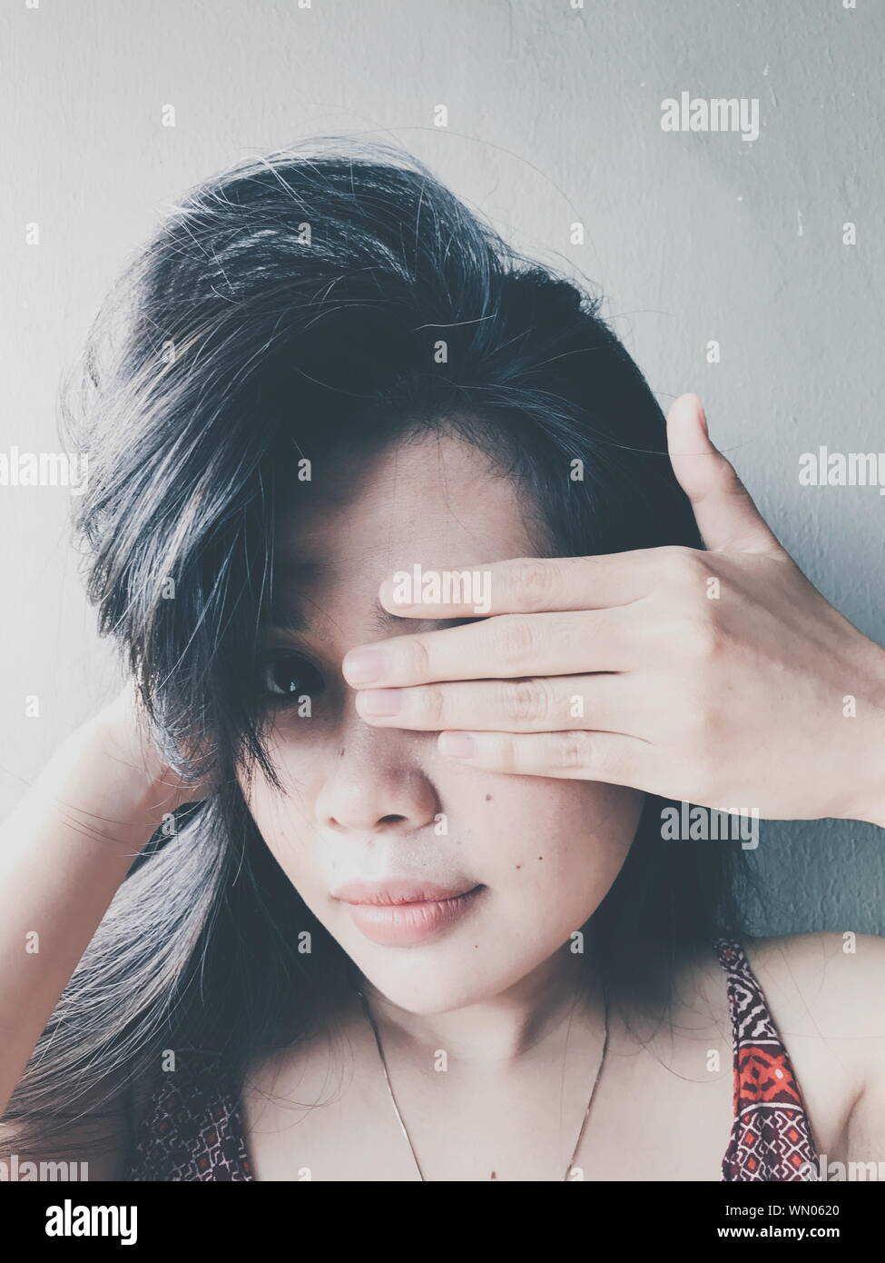 Hands covering eye hi-res stock photography and images - Alamy