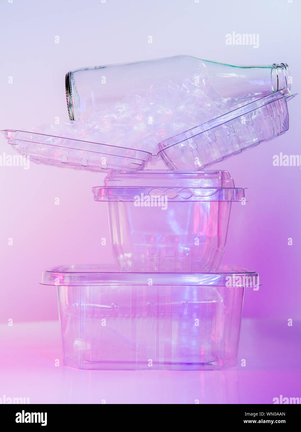 Glass bottle and plastic containers Stock Photo - Alamy