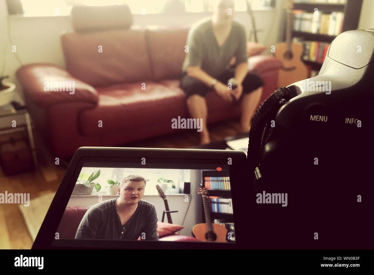Filming interview home hi-res stock photography and images - Alamy
