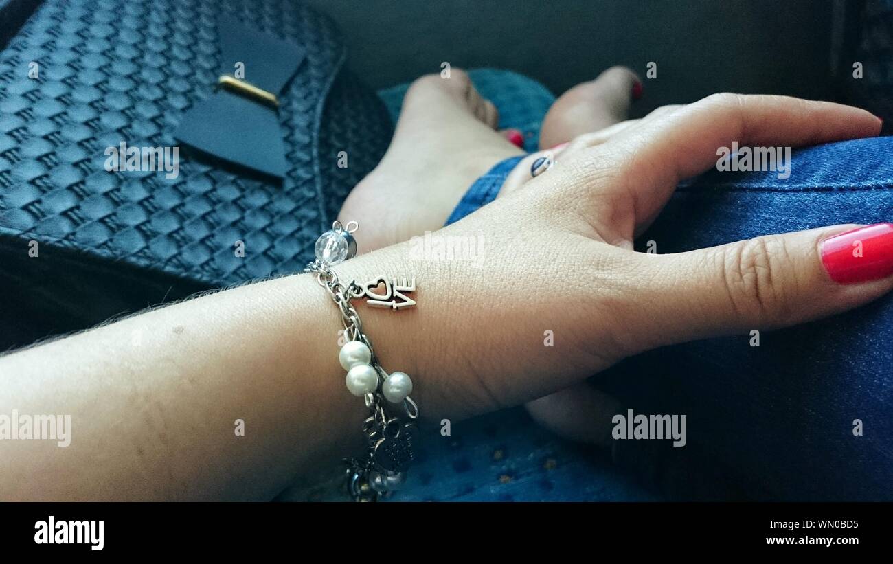 Woman touching leg hi-res stock photography and images - Alamy