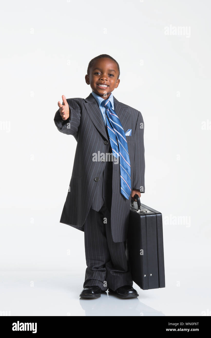 Boy dressed as businessman Stock Photo - Alamy