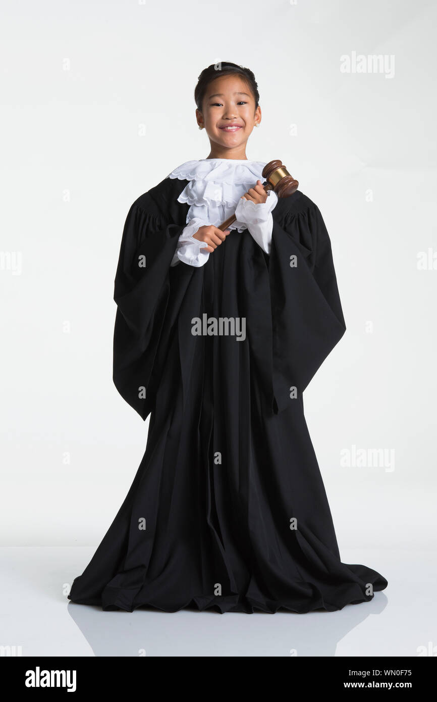 Teenage girl dressed as judge Stock Photo - Alamy