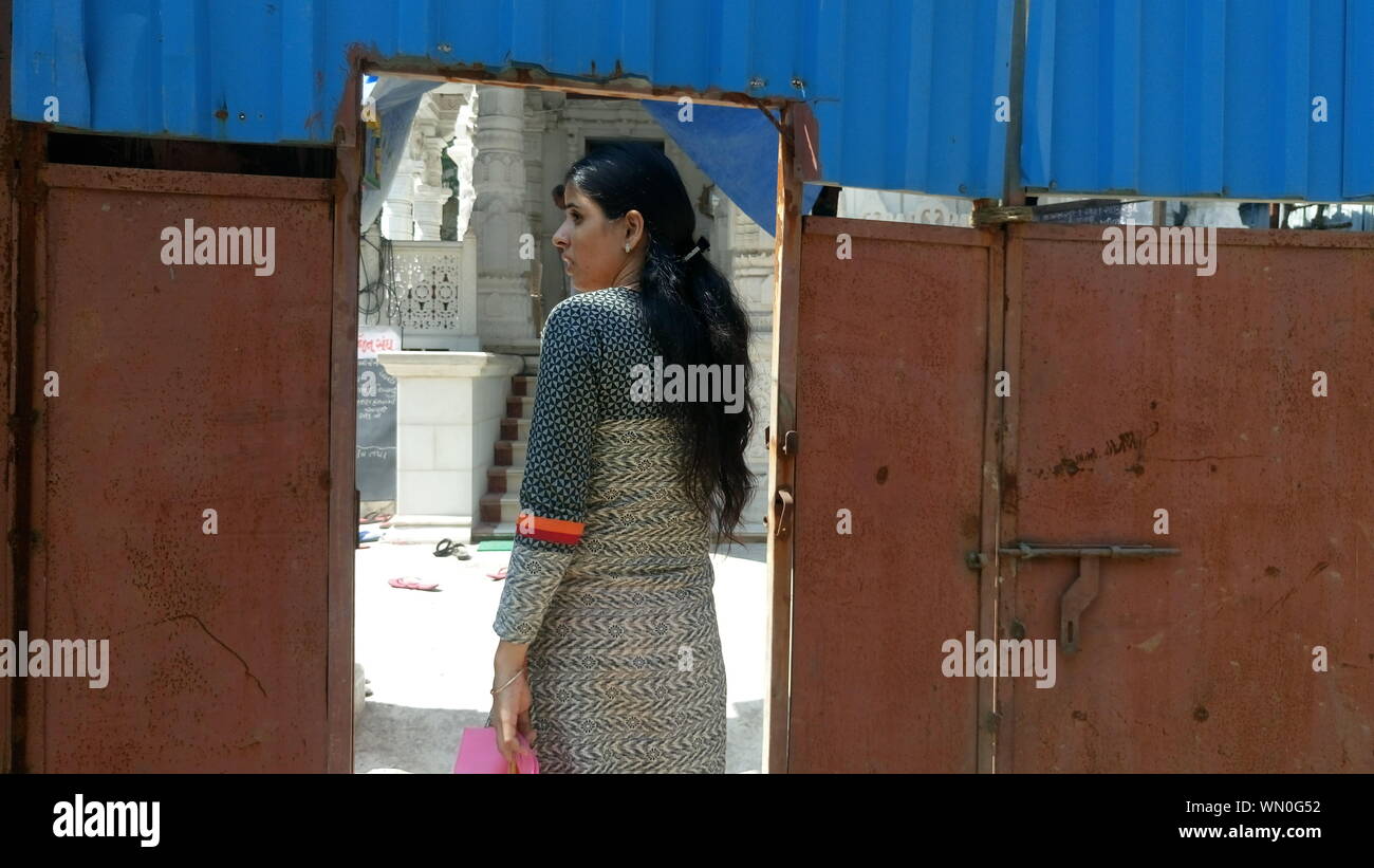 Person entering gate hi-res stock photography and images - Alamy