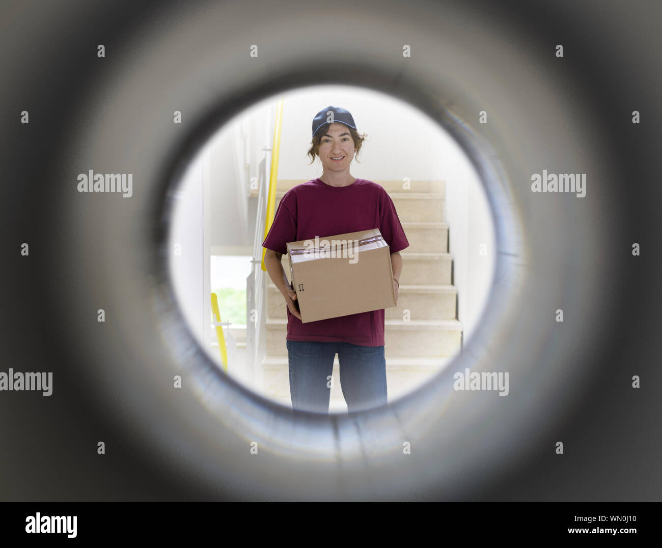 Postman delivering door hi-res stock photography and images - Alamy
