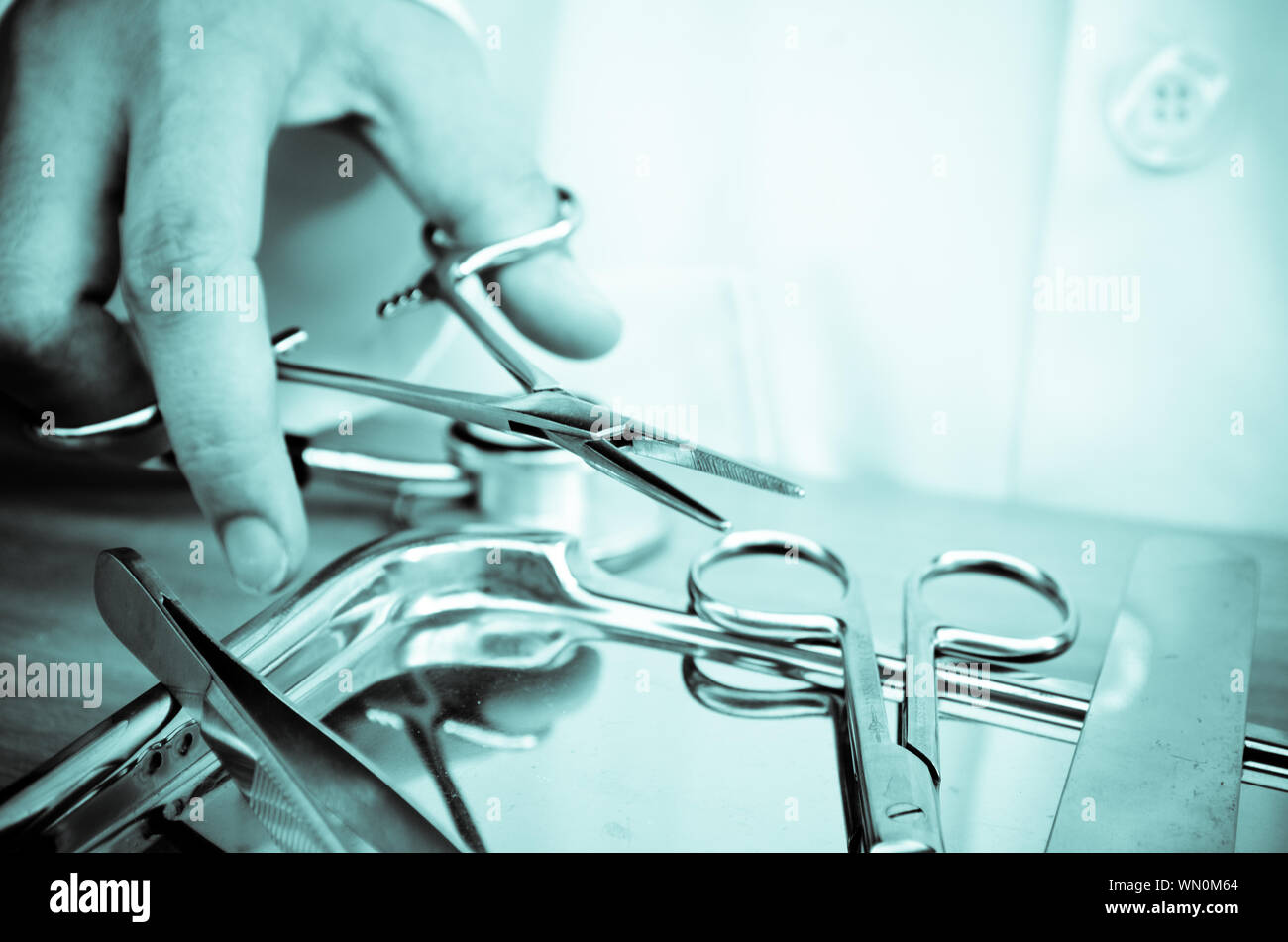 Doctor scissors hi-res stock photography and images - Alamy