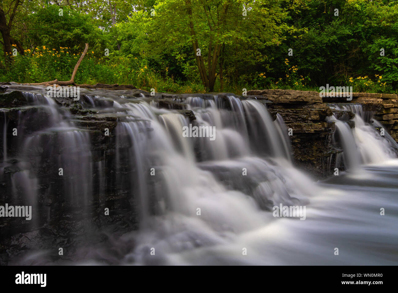 Water flowing down the cascade in Waterfall Glen Forest Preserve ...