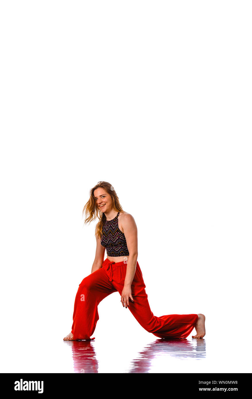 Disco dancer showing some movements against isolated white background ...