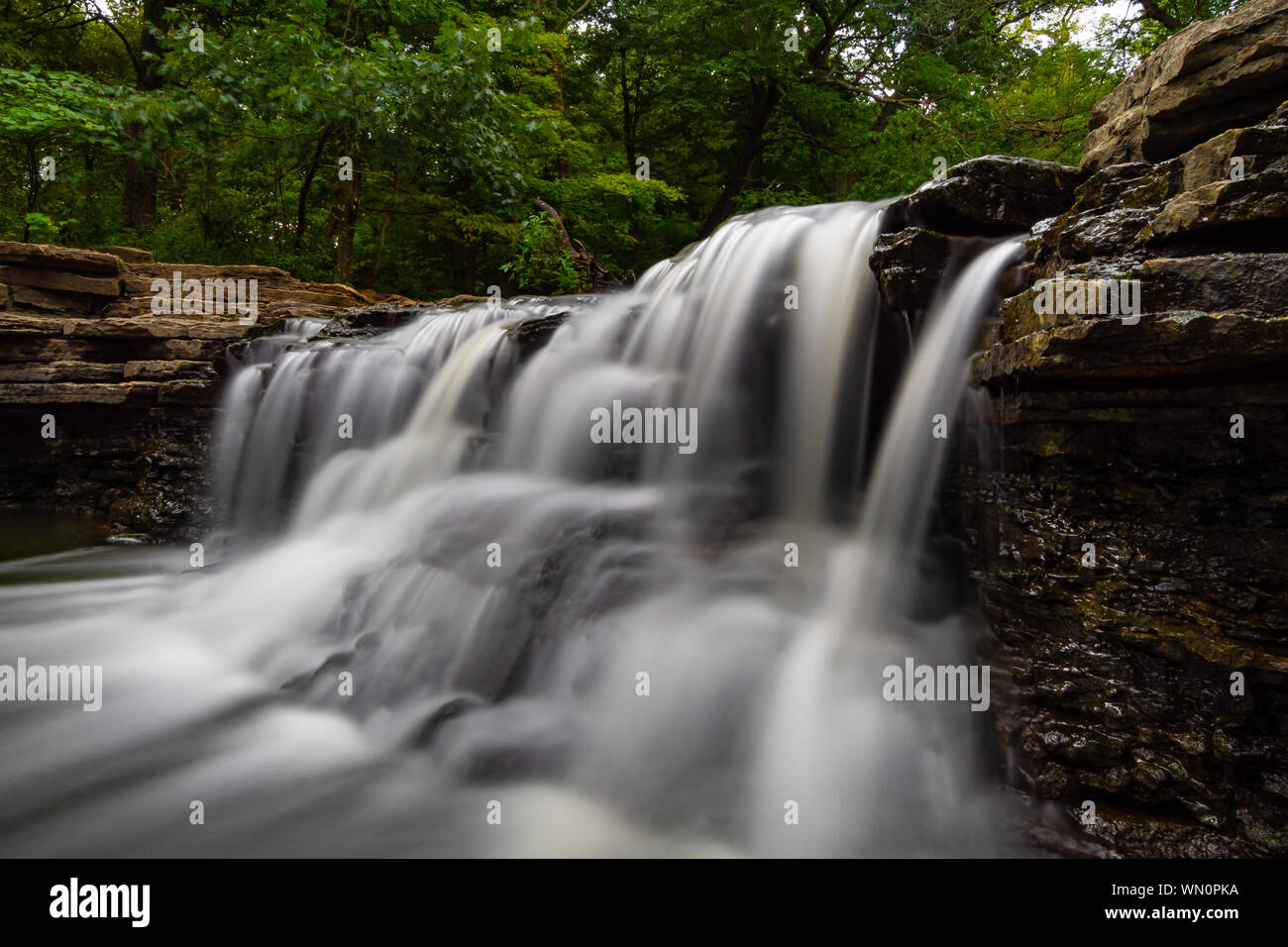 Water flowing down the cascade in Waterfall Glen Forest Preserve ...