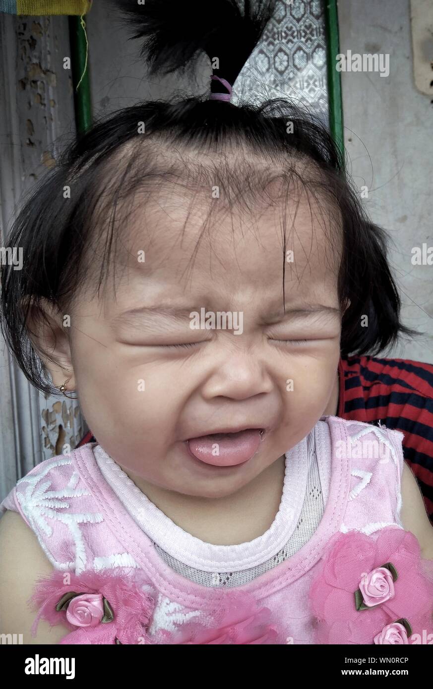 Baby with eyes closed hi-res stock photography and images - Alamy