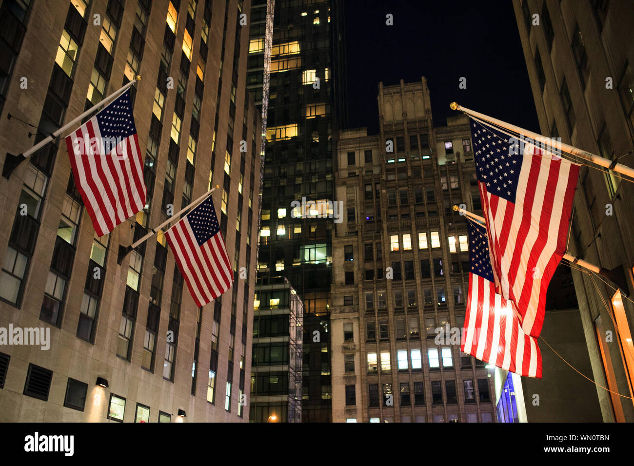 American flags on buildings hi-res stock photography and images - Alamy
