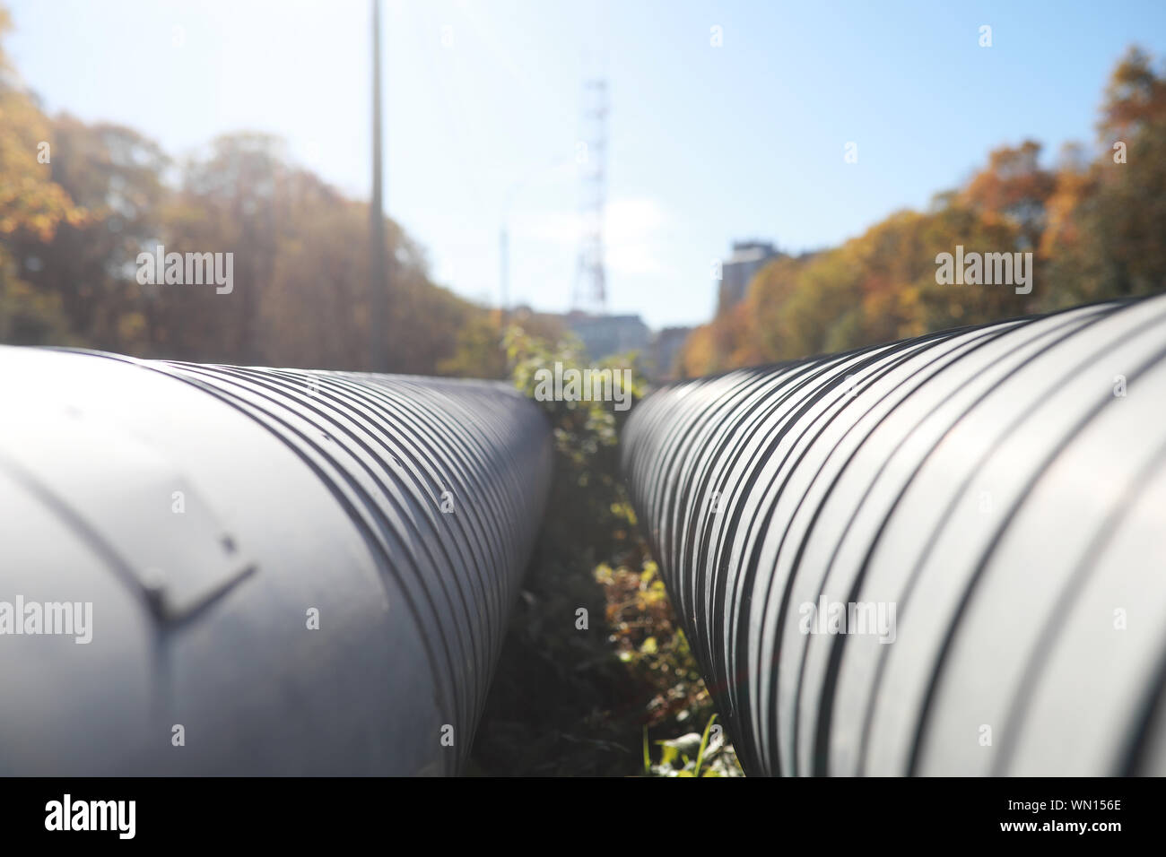 Industrial pipes on street construction Stock Photo - Alamy