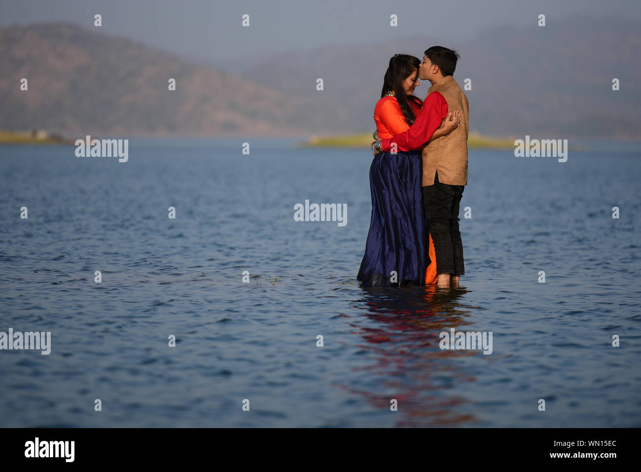 Couple kissing in water hi-res stock photography and images - Alamy