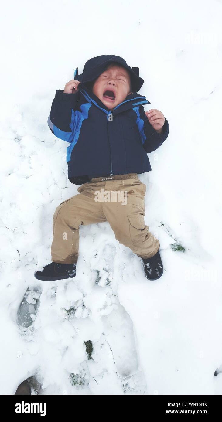 Baby Lying Down Crying High Resolution Stock Photography and Images - Alamy