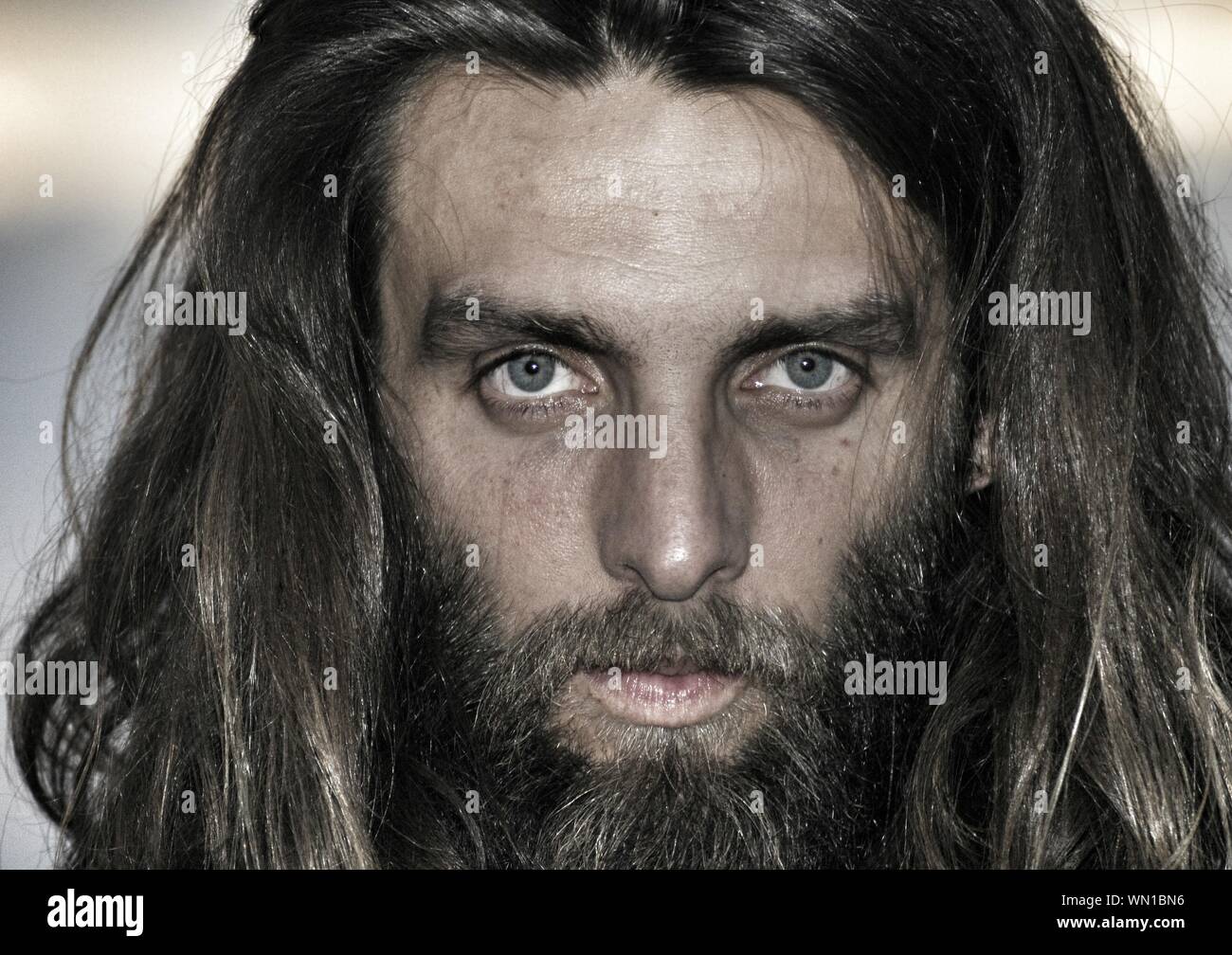 Long haired young man hi-res stock photography and images - Alamy