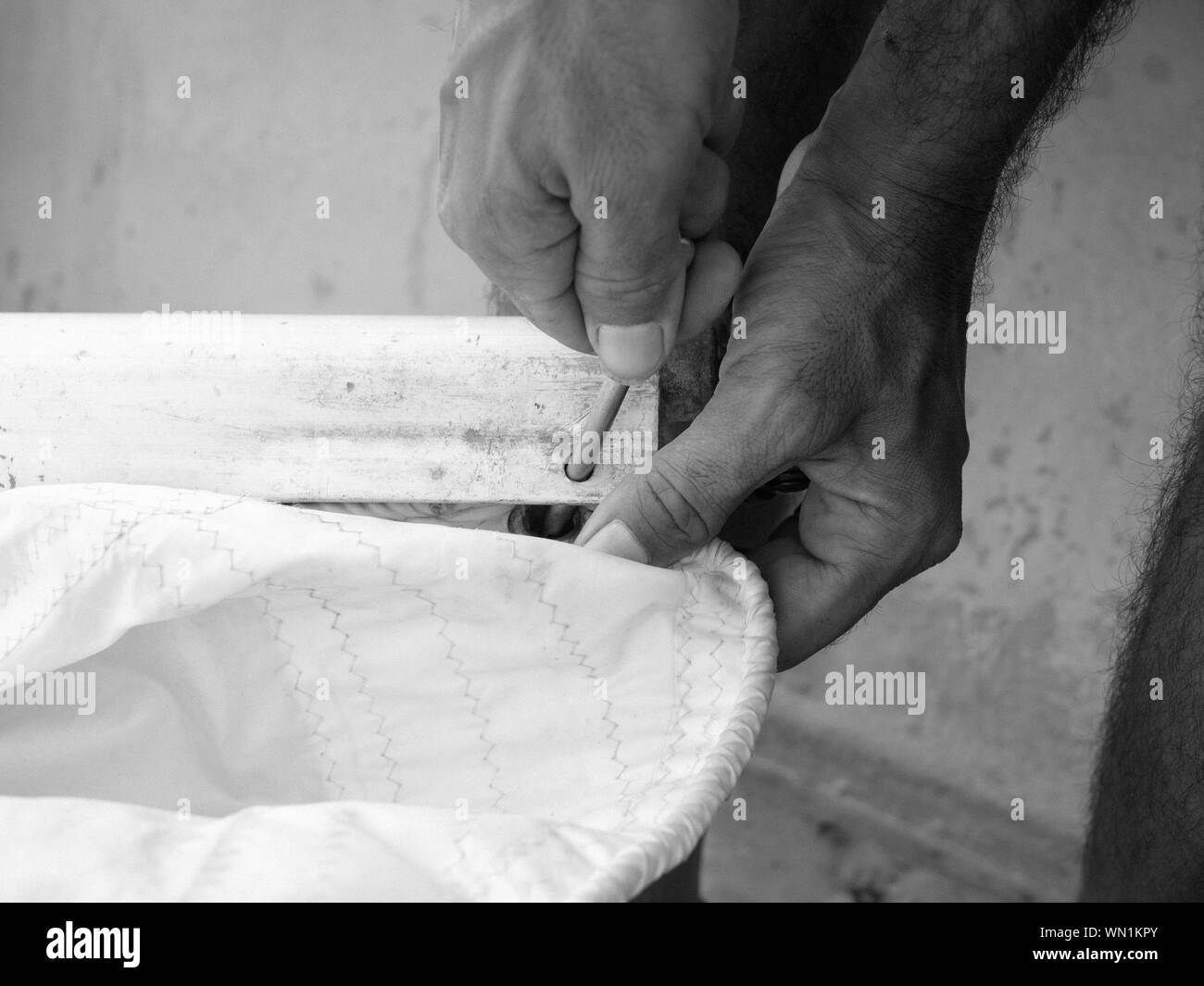 Hands Fixing High Resolution Stock Photography and Images - Alamy