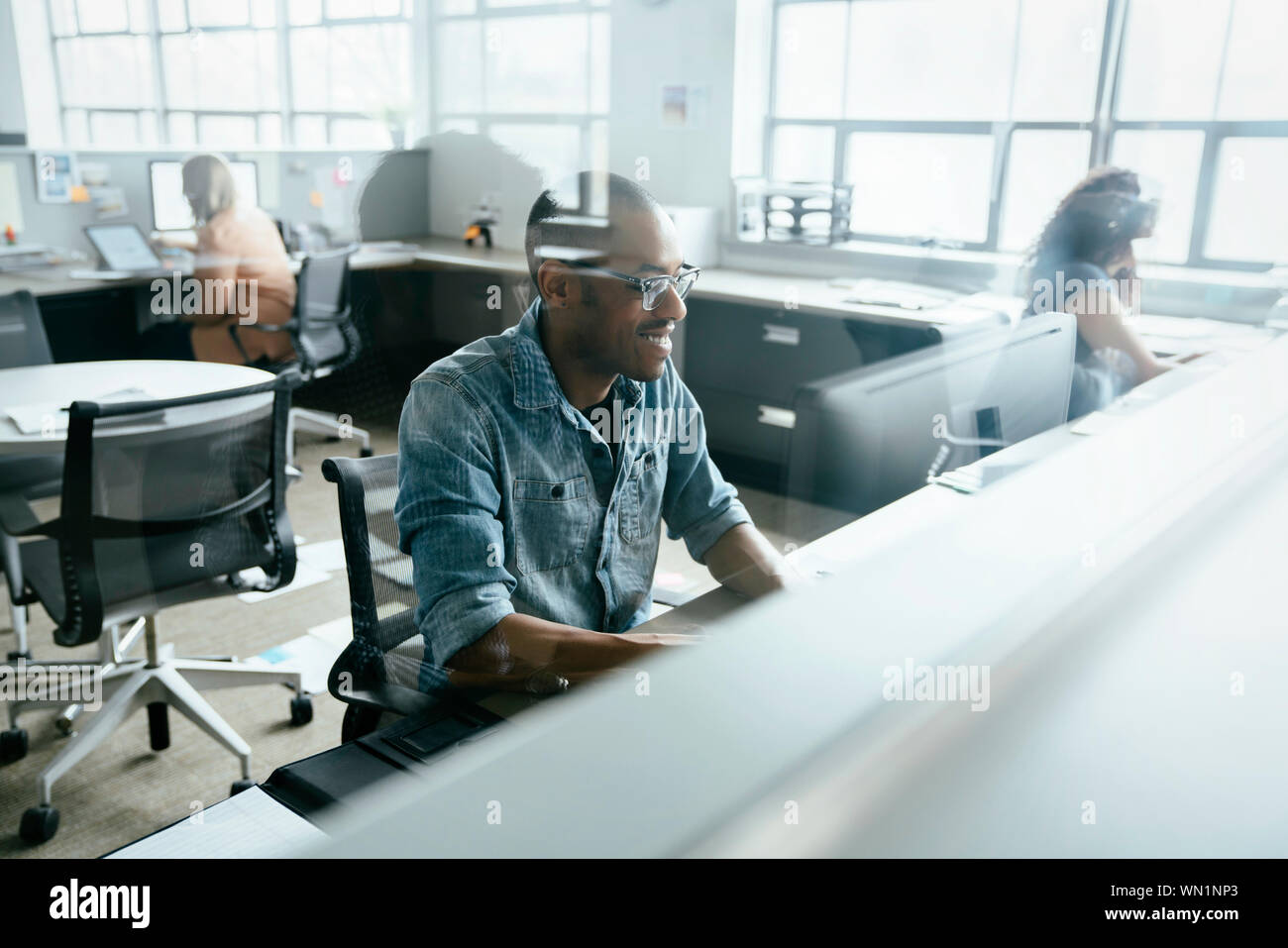 Man office sitting down desk chair High Resolution Stock Photography ...