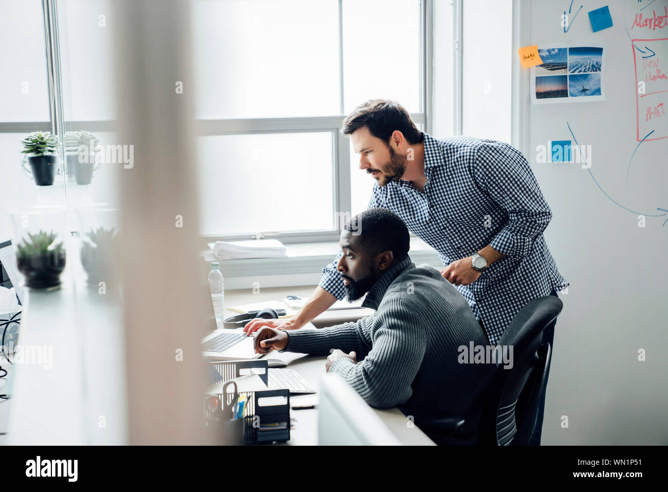 Men using computer in office Stock Photo - Alamy