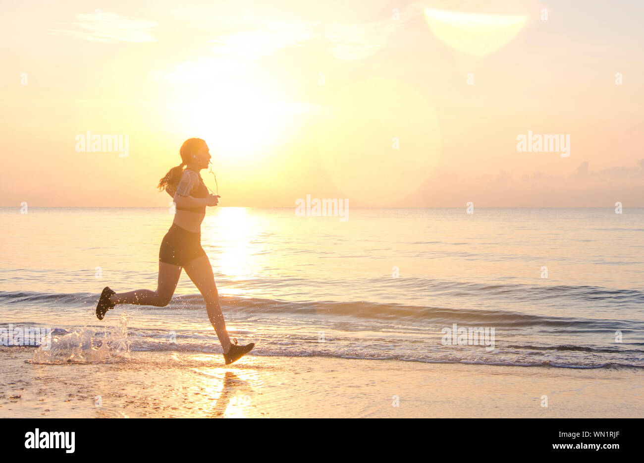 Woman beach band hi-res stock photography and images - Alamy
