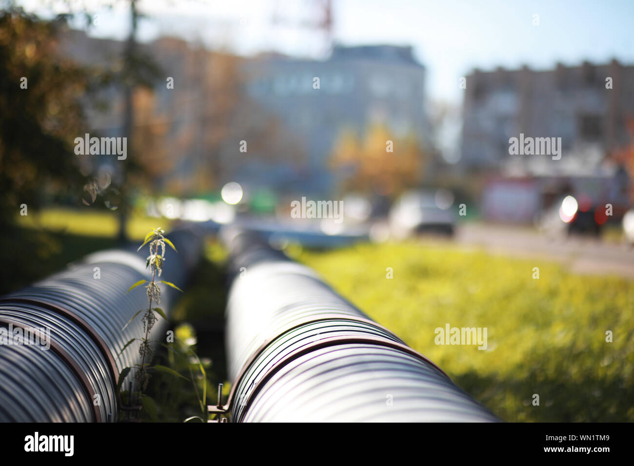 Industrial pipes on street construction Stock Photo - Alamy