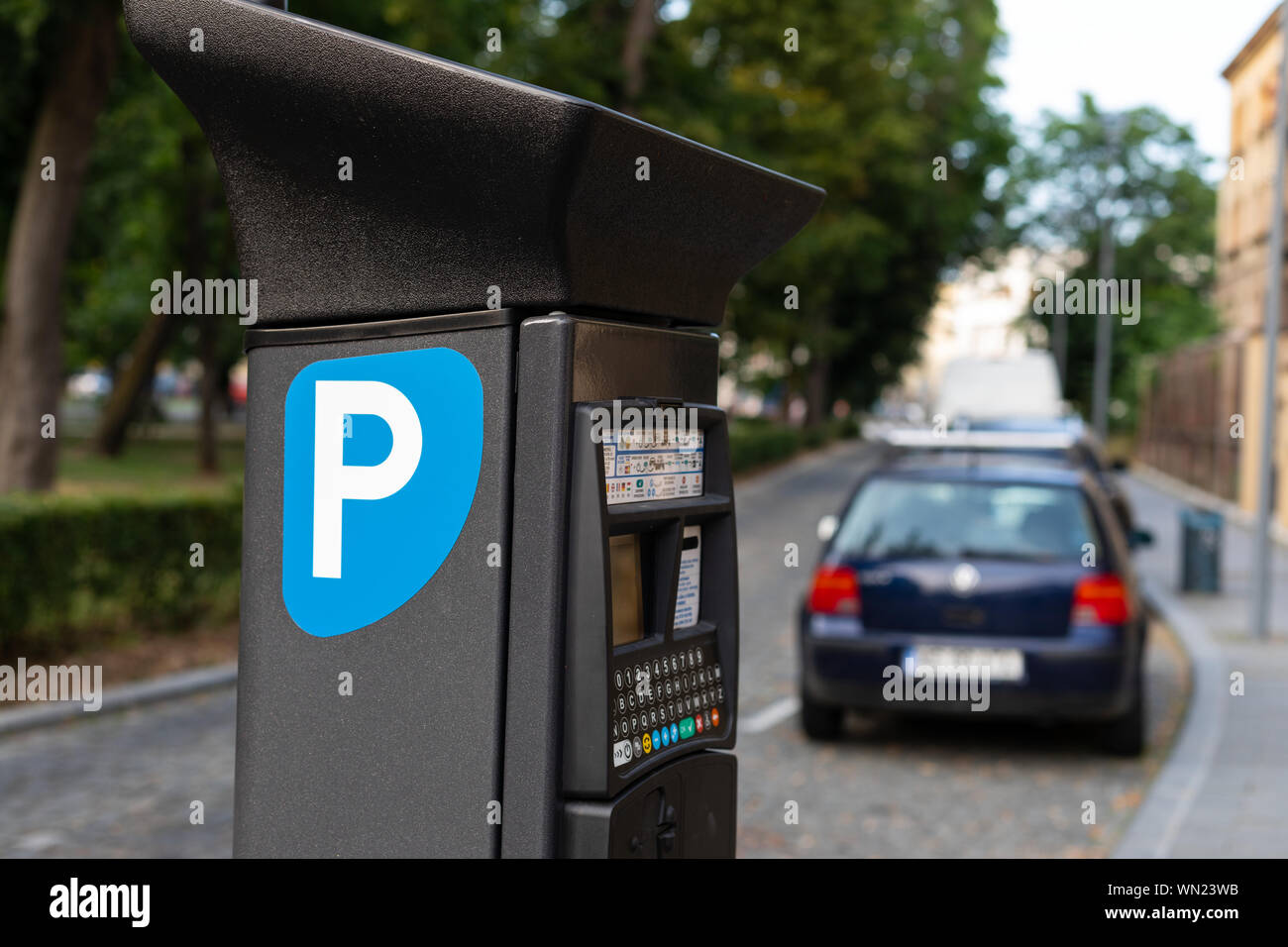 Parking payment machine along the road in a city downtown Stock Photo ...