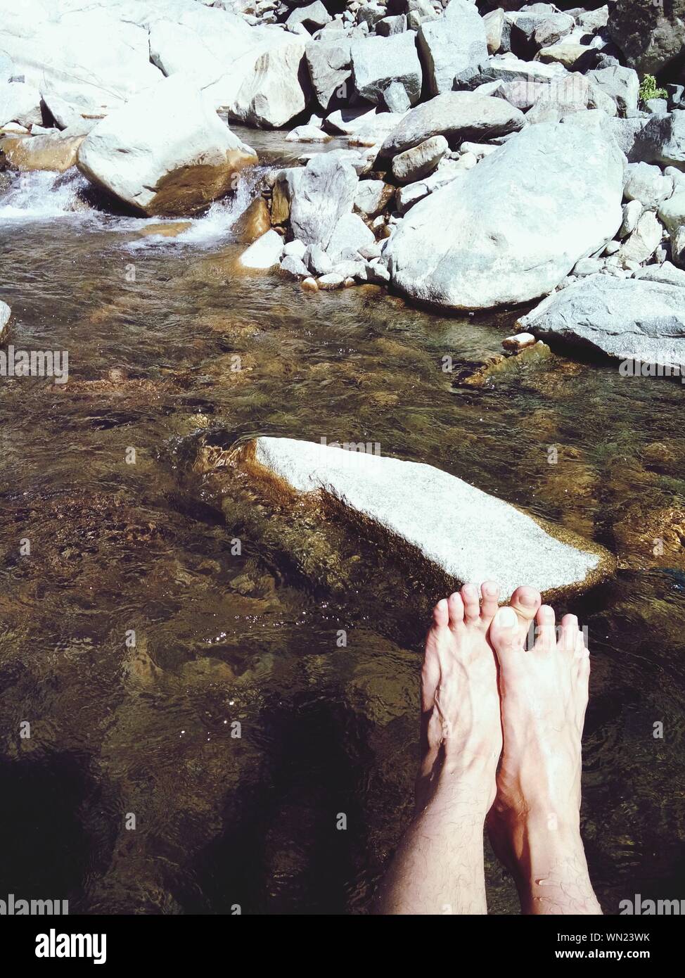 Feet in river hi-res stock photography and images - Alamy