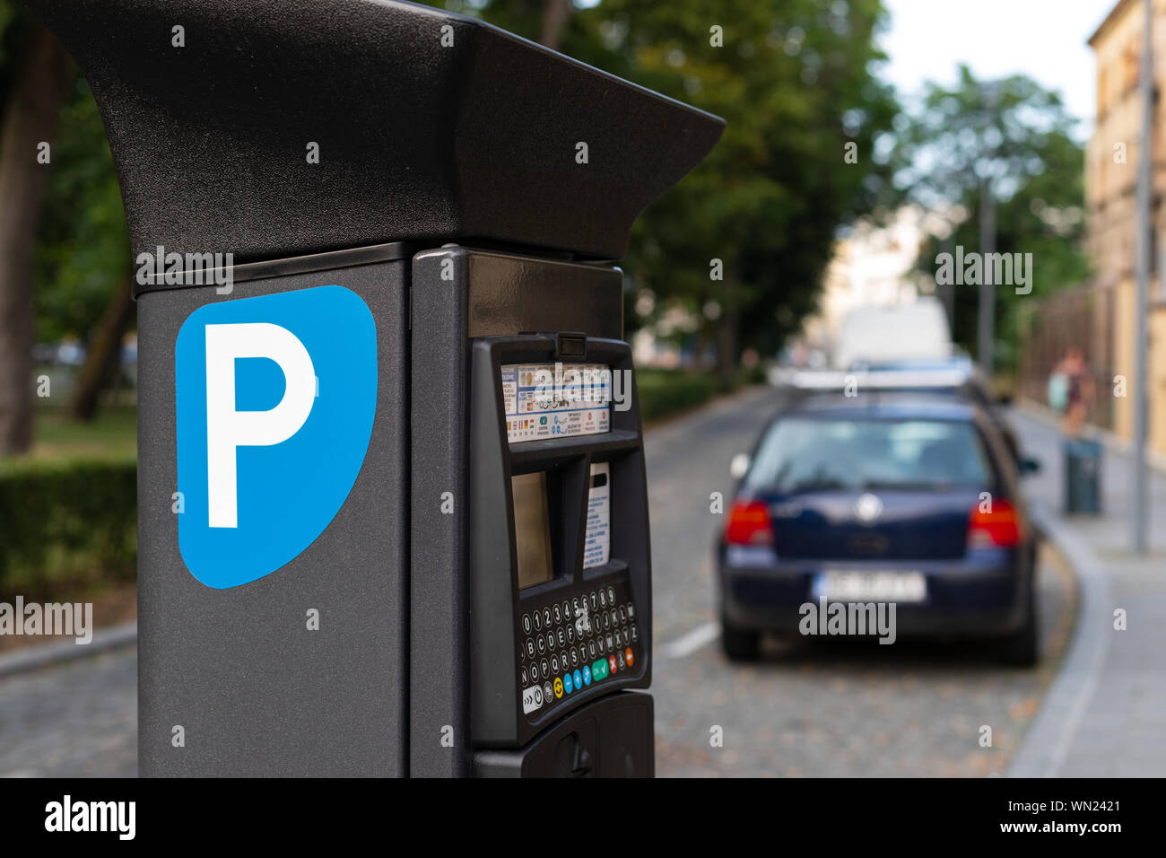Parking payment machine along the road in a city downtown Stock Photo ...