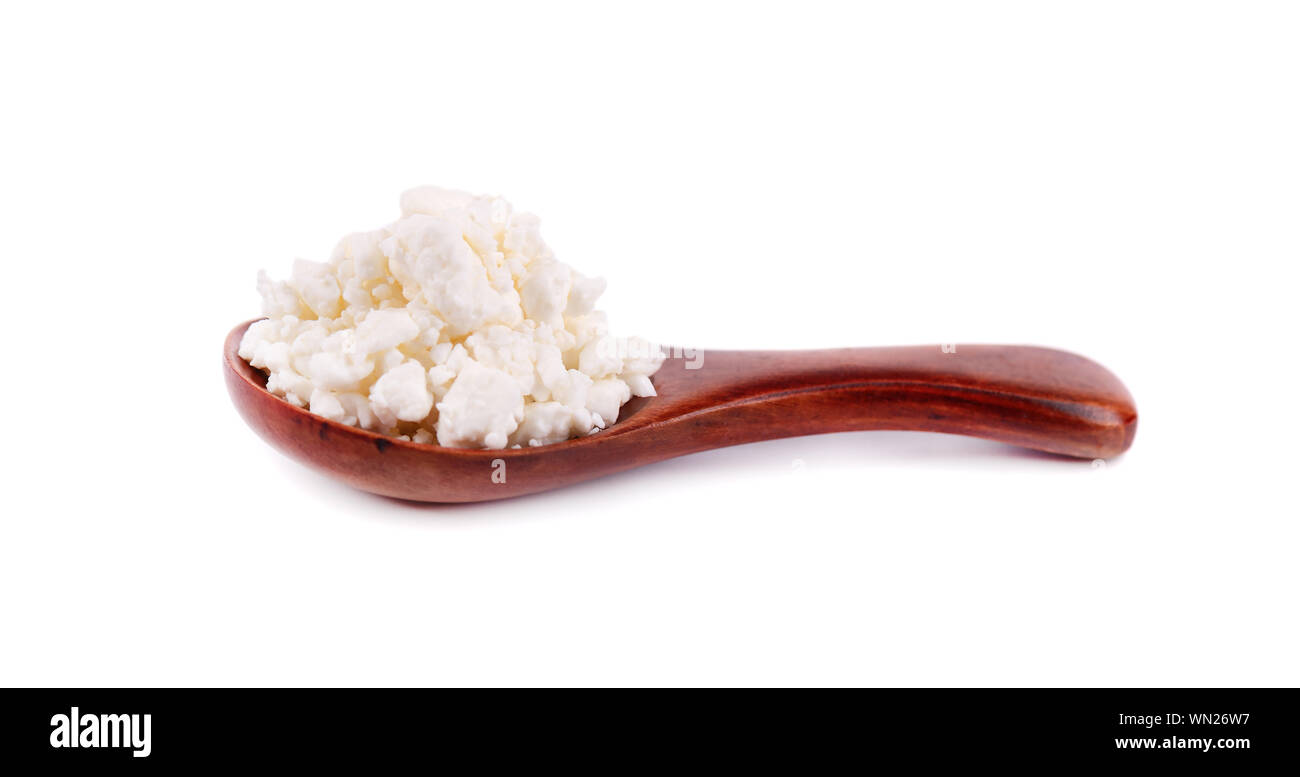 Raw curd on wooden Cut Out Stock Images & Pictures - Alamy