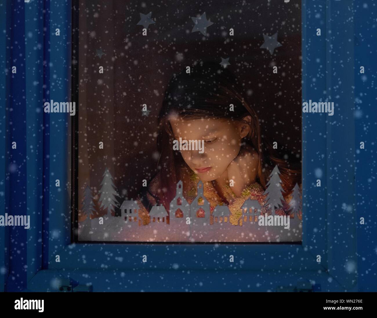 Child girl looking window winter hi-res stock photography and images ...