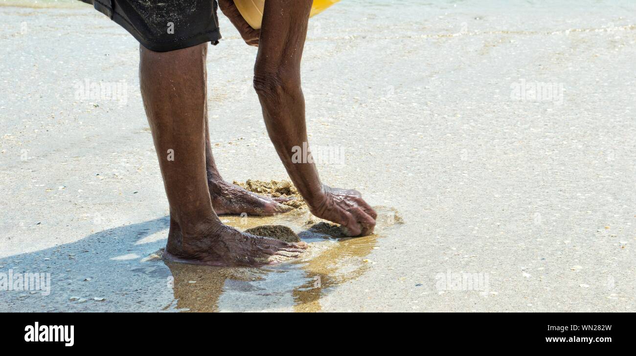 Touching sand hi-res stock photography and images - Alamy