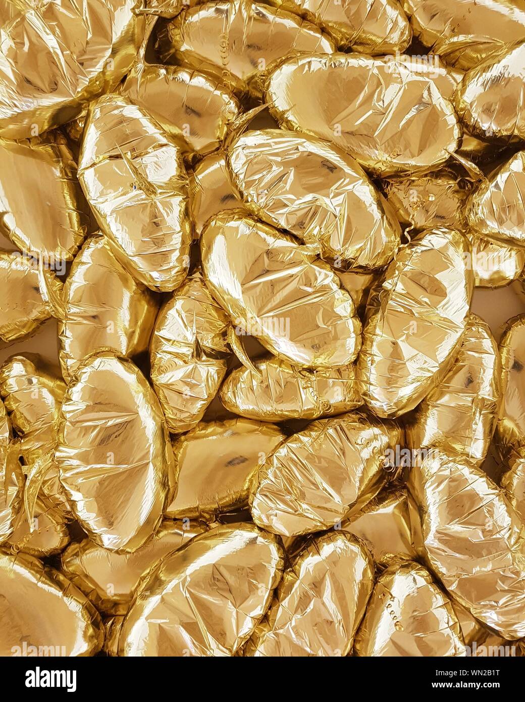 Gold paper wrapping hi-res stock photography and images - Alamy