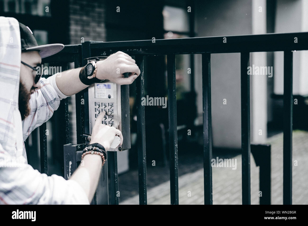 Person entering gate hi-res stock photography and images - Alamy