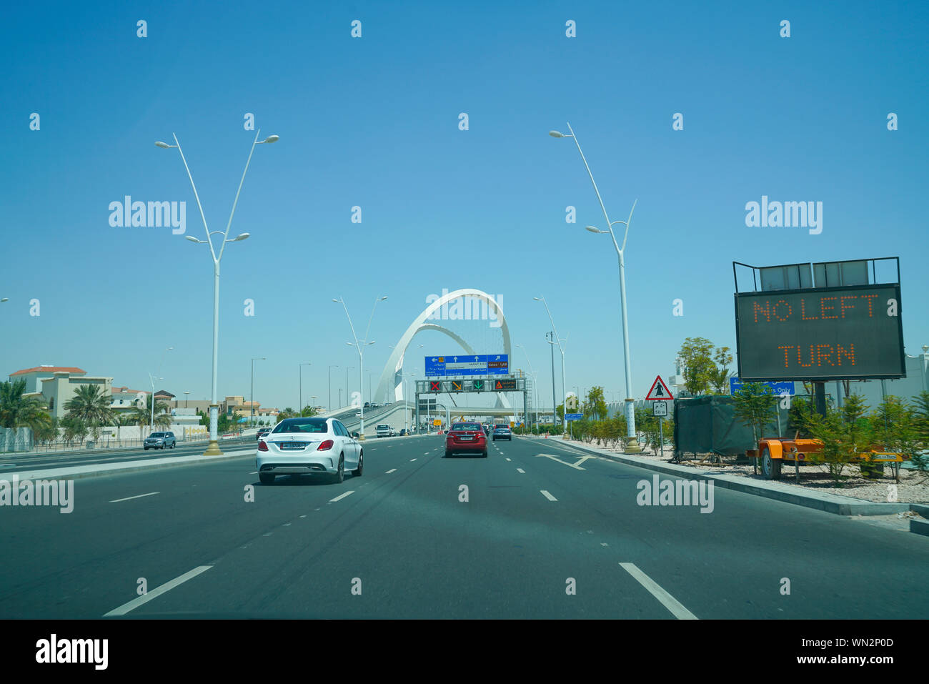 DOHA QATAR - JULY 10 2019; Memorial arches over Lusail Highway are ...