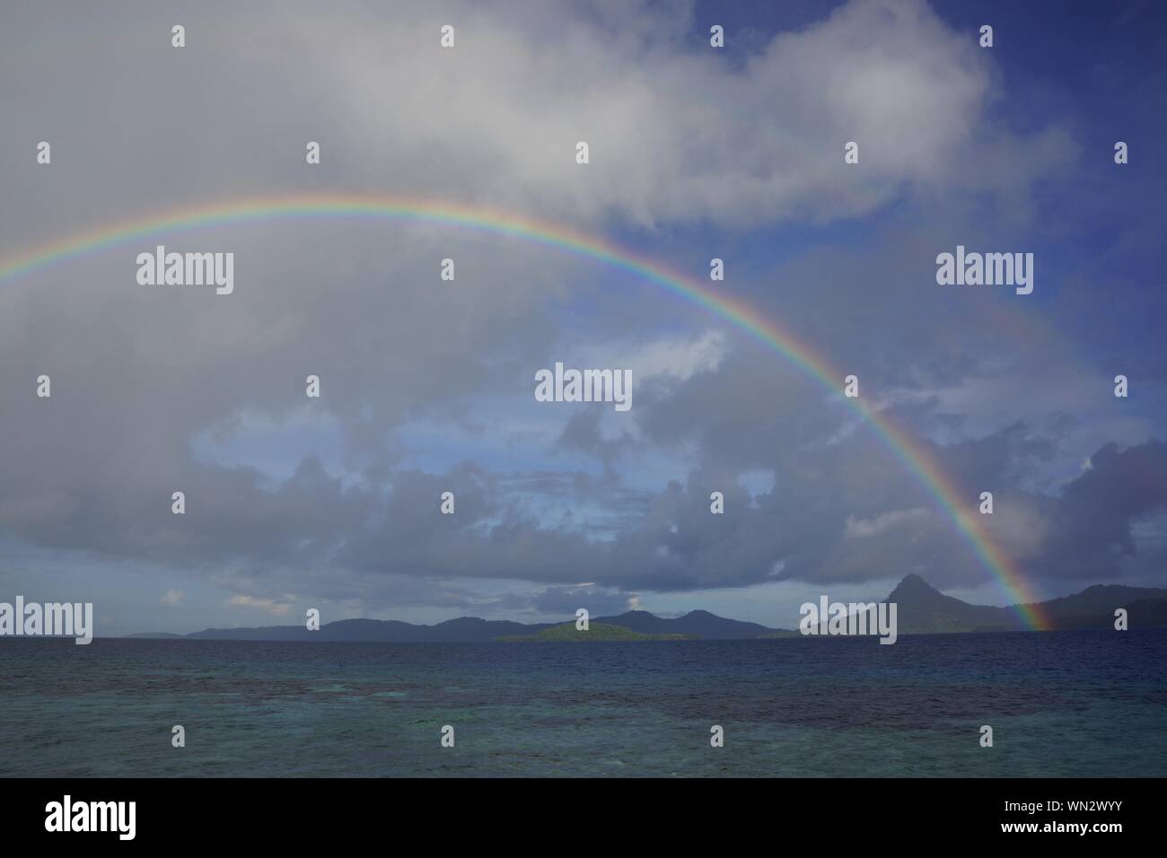 Rainbow over ocean hi-res stock photography and images - Alamy