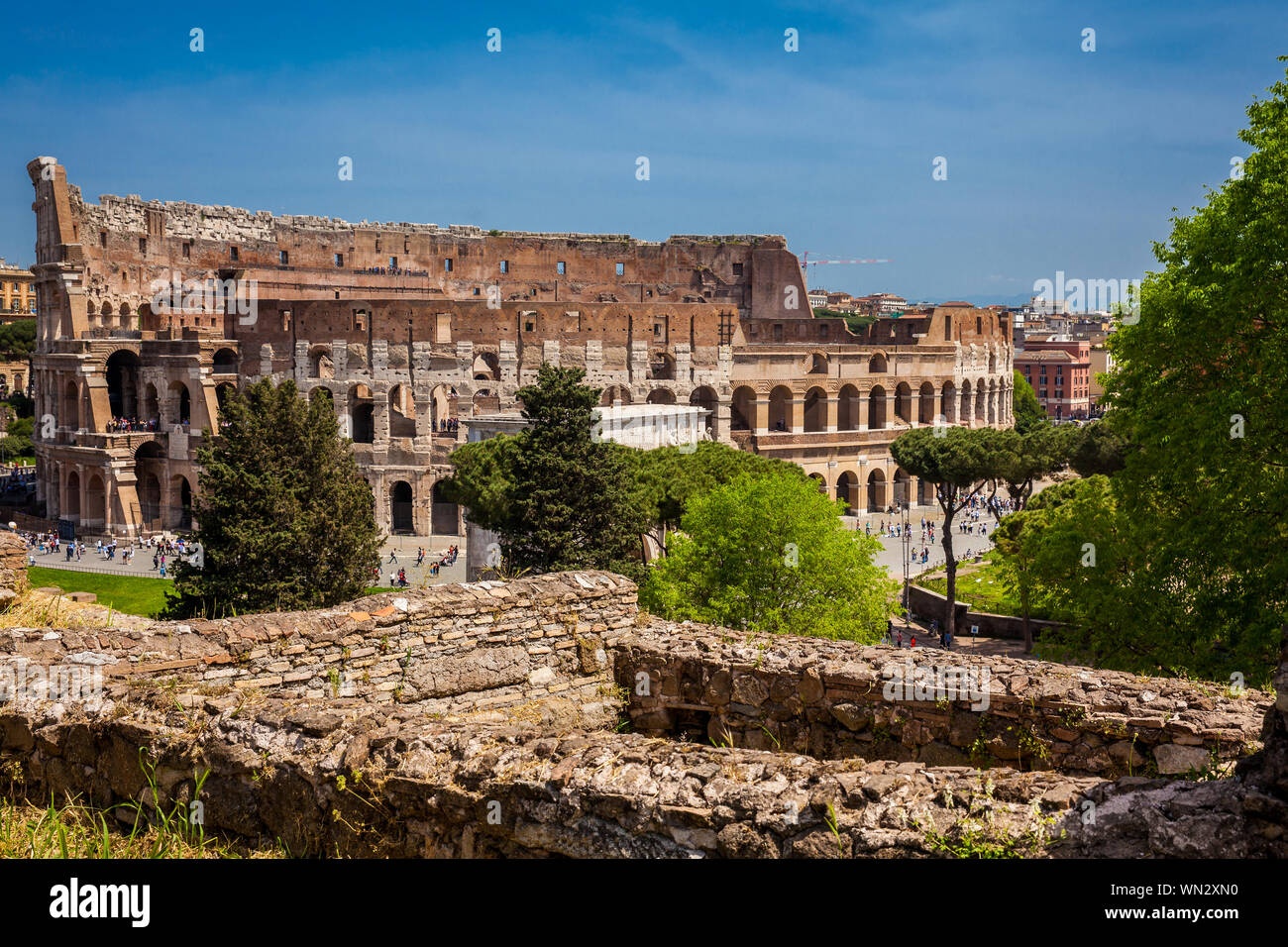 ROME, ITALY - APRIL, 2018: Tourists visiting the famous Colosseum in ...