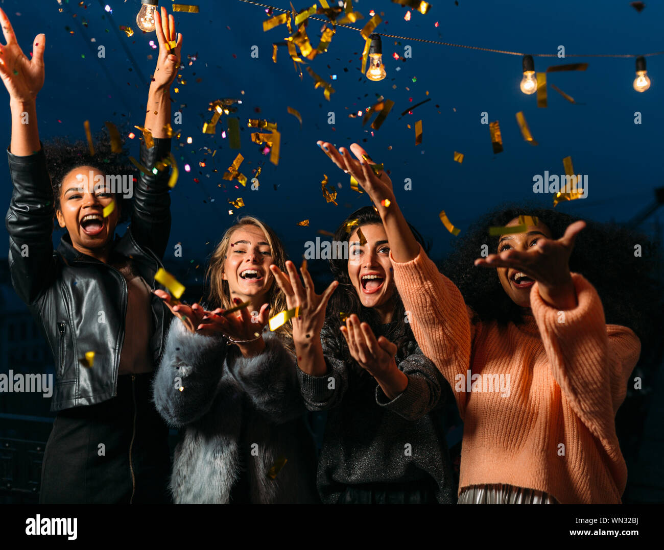 Women friendship confetti hi-res stock photography and images - Alamy