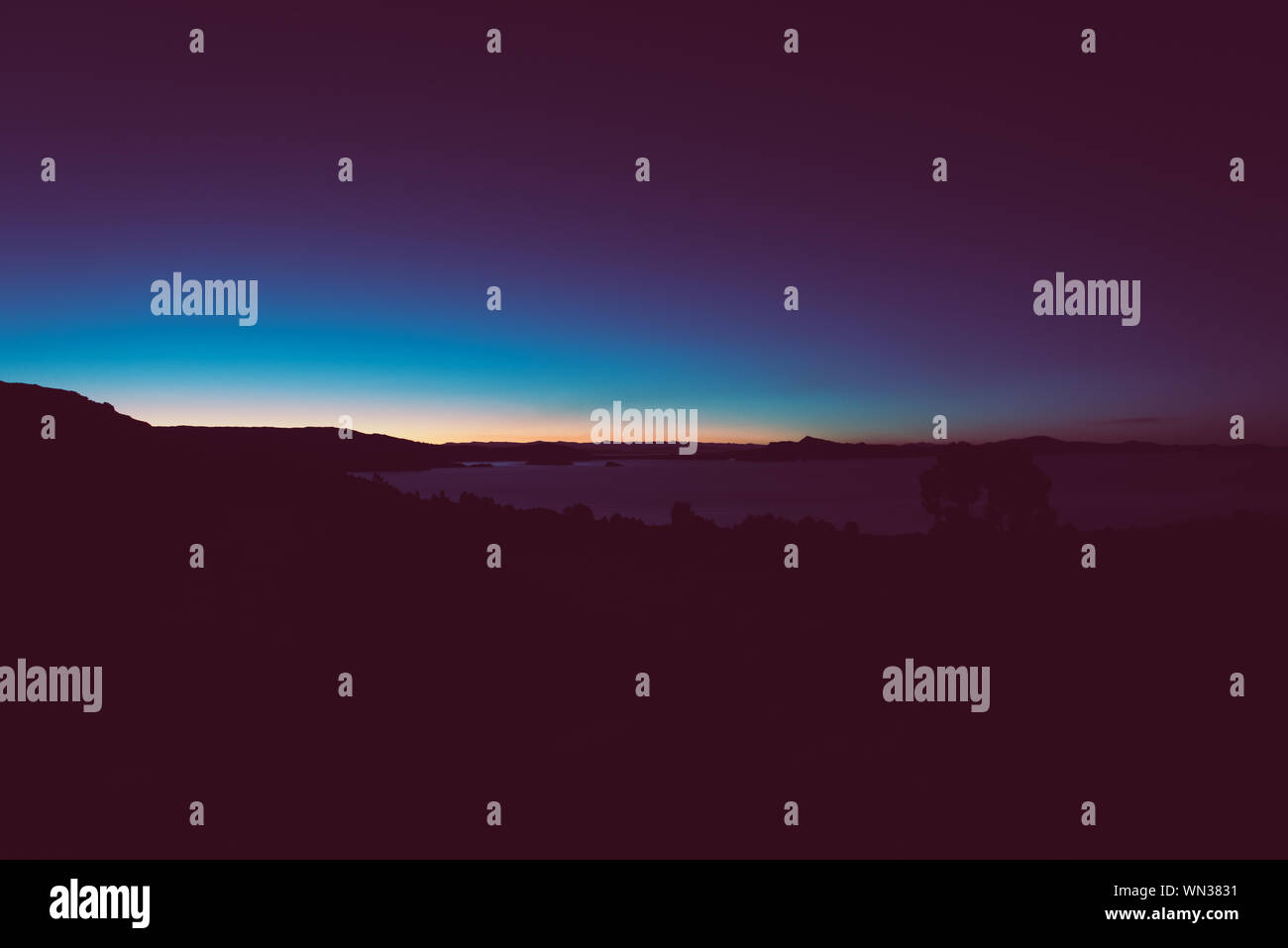 Hill silhouette during sunset Stock Photo - Alamy