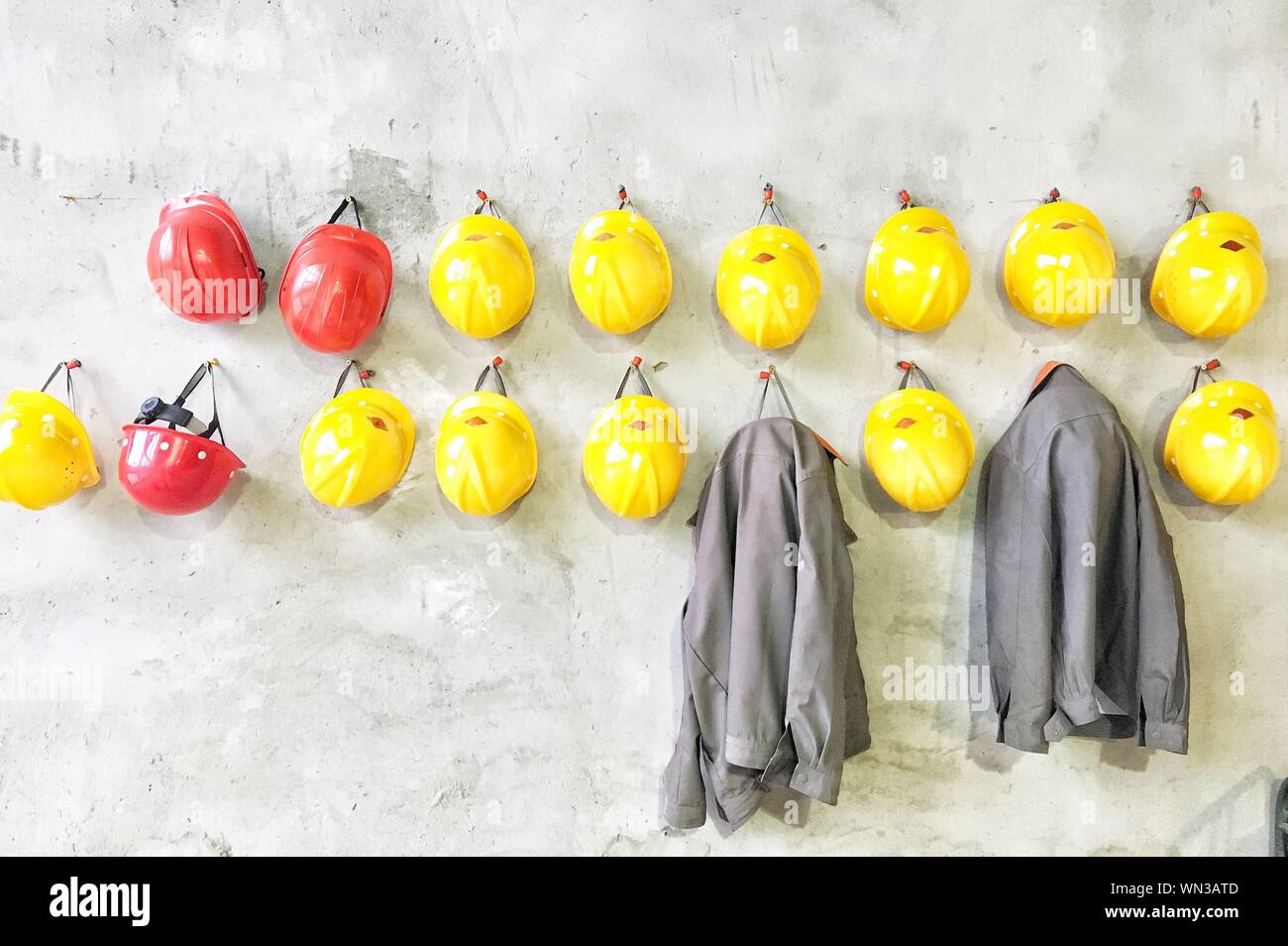 Hardhats hanging hi-res stock photography and images - Alamy