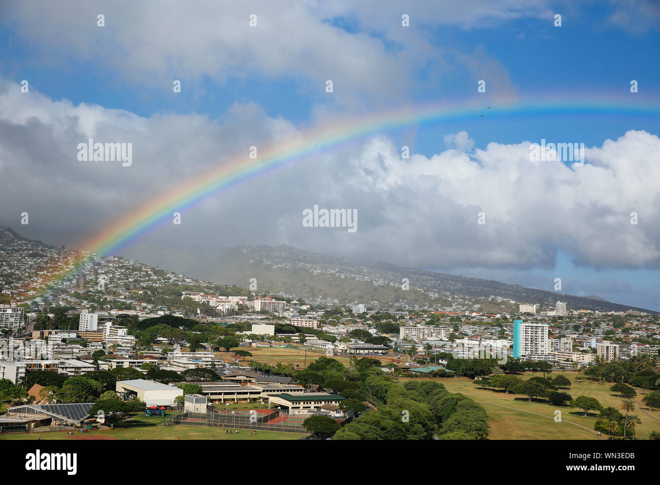 rainbow over the sky honolulu city view hawaii Stock Photo - Alamy