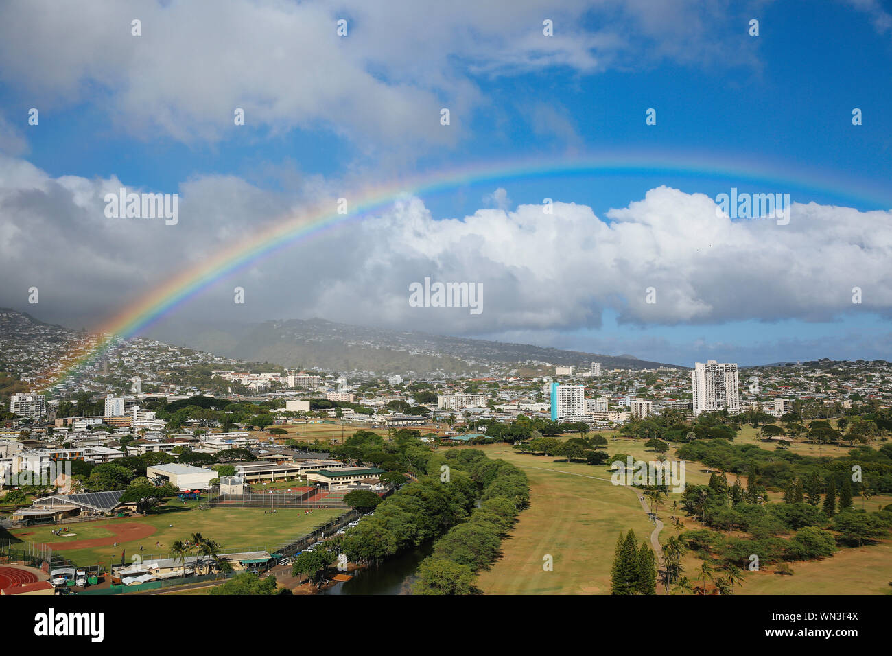 rainbow over the sky honolulu city view hawaii Stock Photo - Alamy
