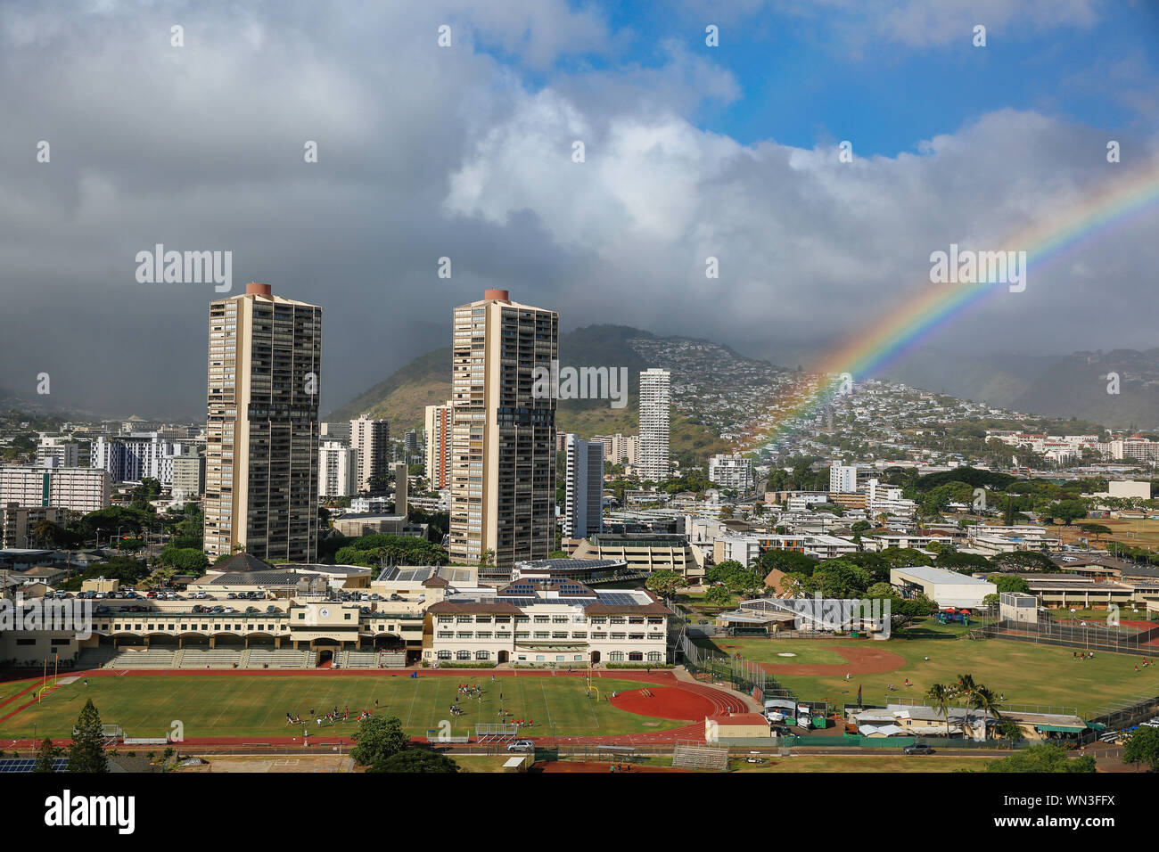 rainbow over the sky honolulu city view hawaii Stock Photo - Alamy