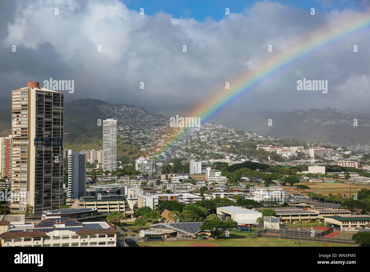 rainbow over the sky honolulu city view hawaii Stock Photo - Alamy