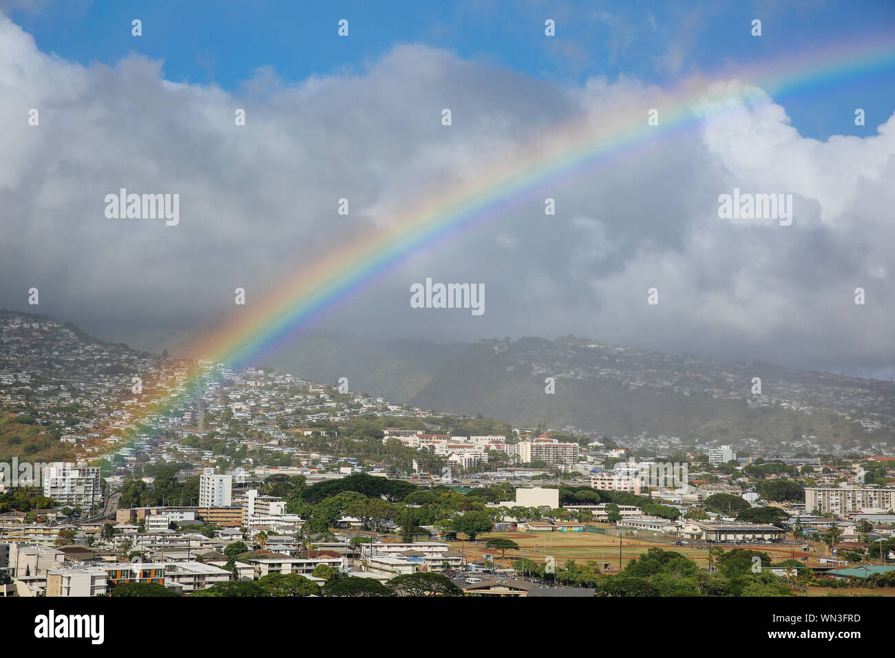 rainbow over the sky honolulu city view hawaii Stock Photo - Alamy