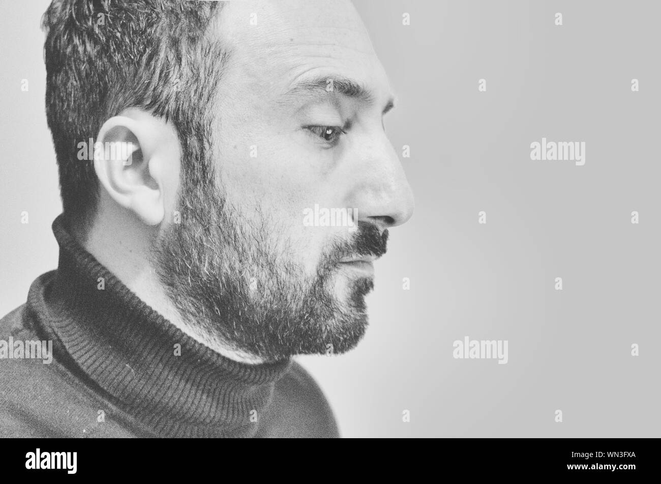 Serious side view Black and White Stock Photos & Images - Alamy