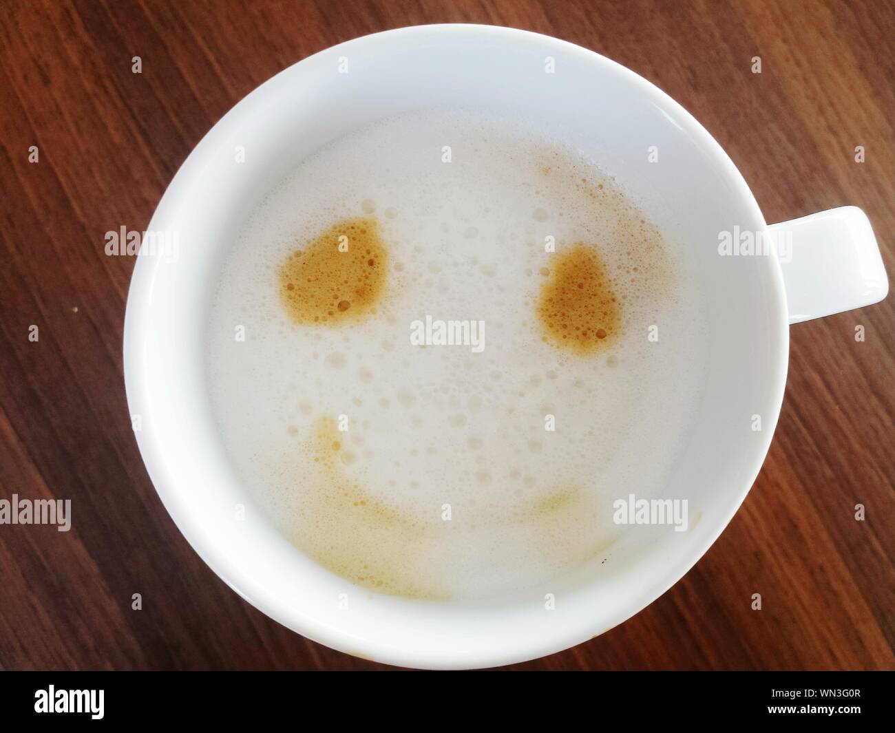 Smiley face coffee hi-res stock photography and images - Alamy