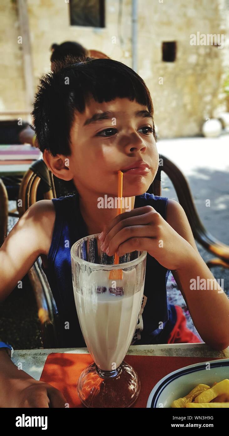 Boy Milkshake Outdoors High Resolution Stock Photography and Images - Alamy