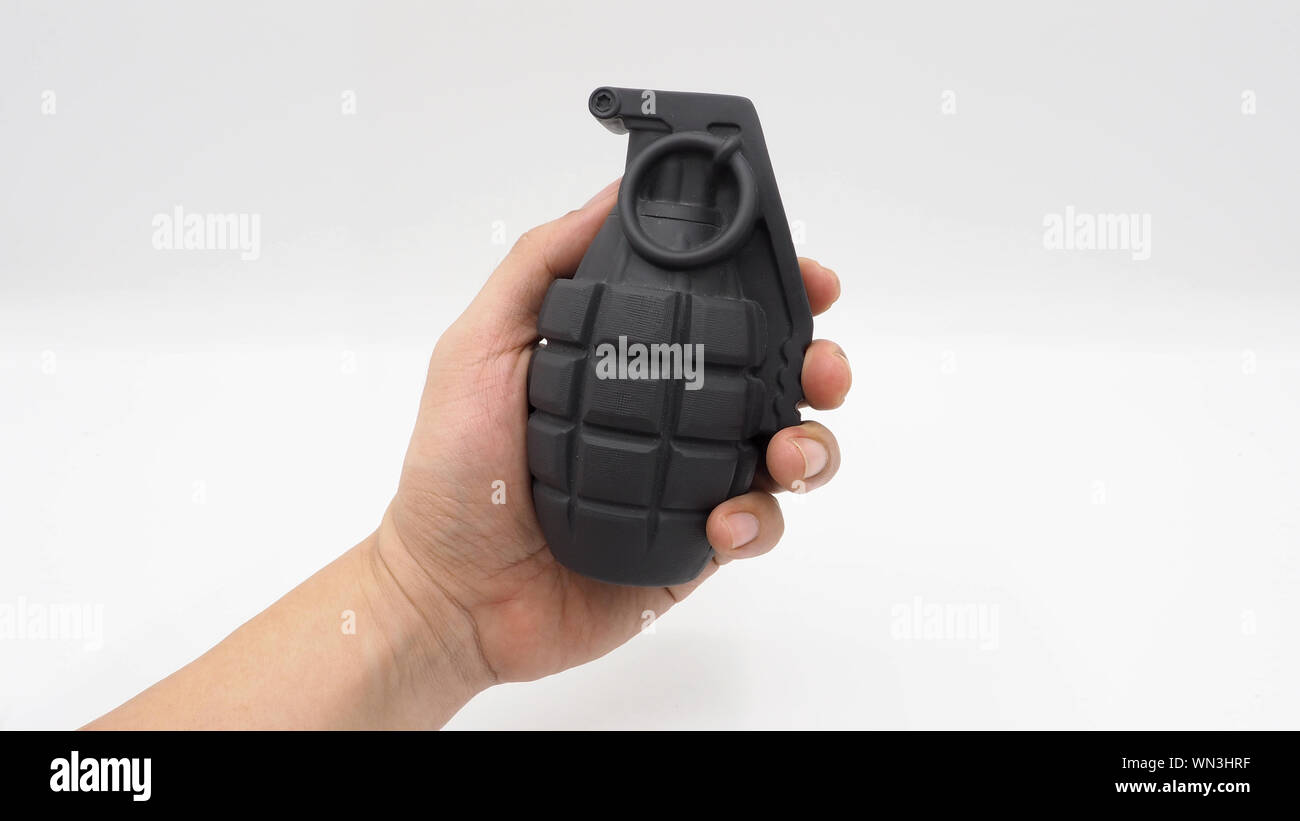 Hand and bomb hi-res stock photography and images - Alamy