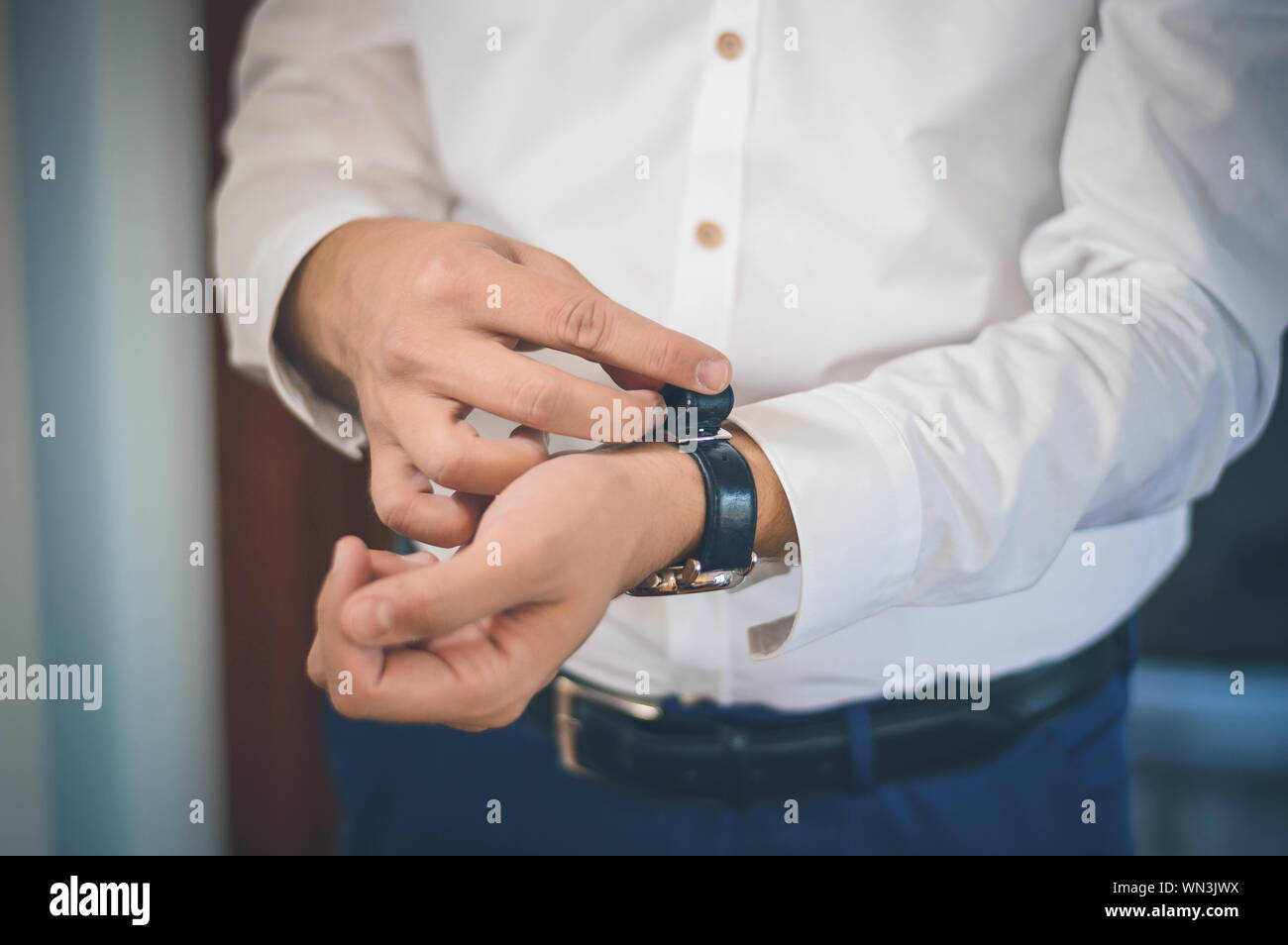 Wearing Wrist Watch High Resolution Stock Photography and Images - Alamy