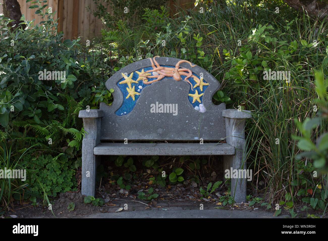 A bench with an octopus design, in Newport, Oregon, USA Stock Photo - Alamy