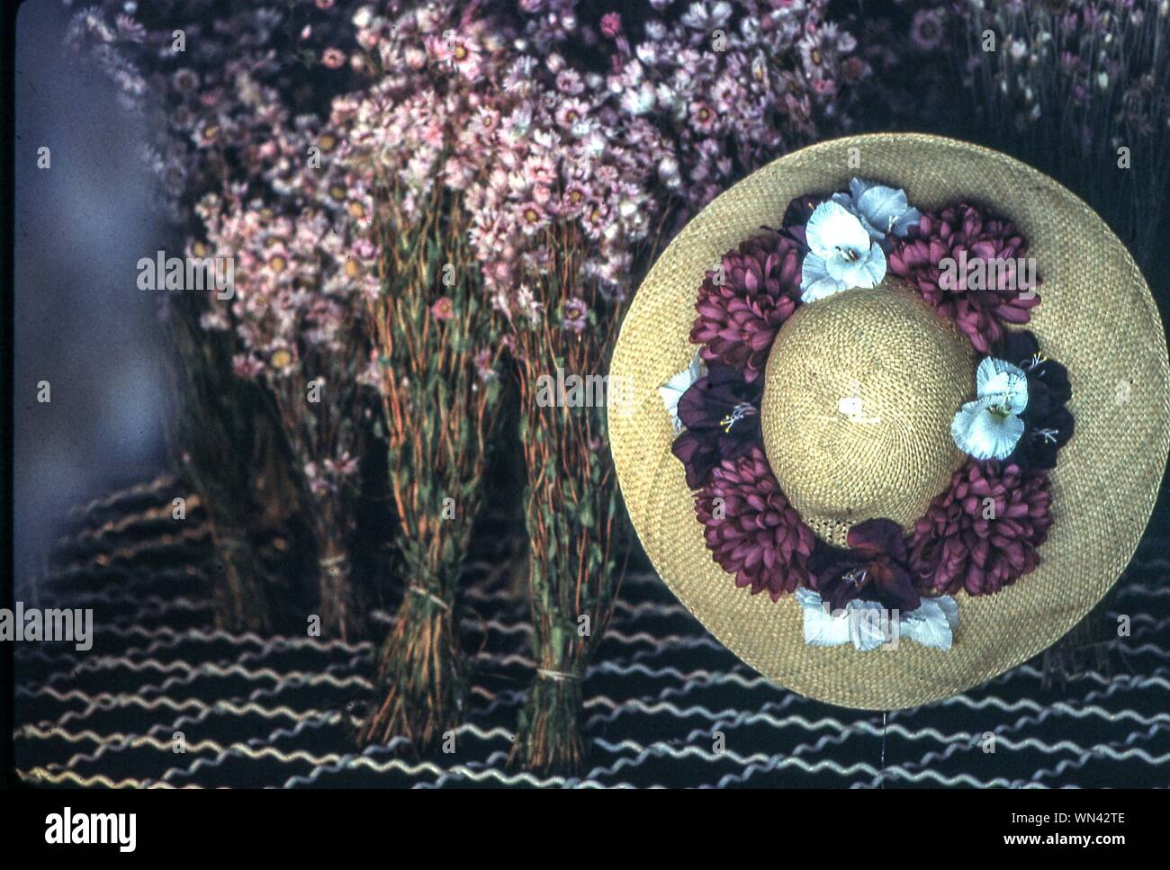 Hat and flowers hi-res stock photography and images - Alamy