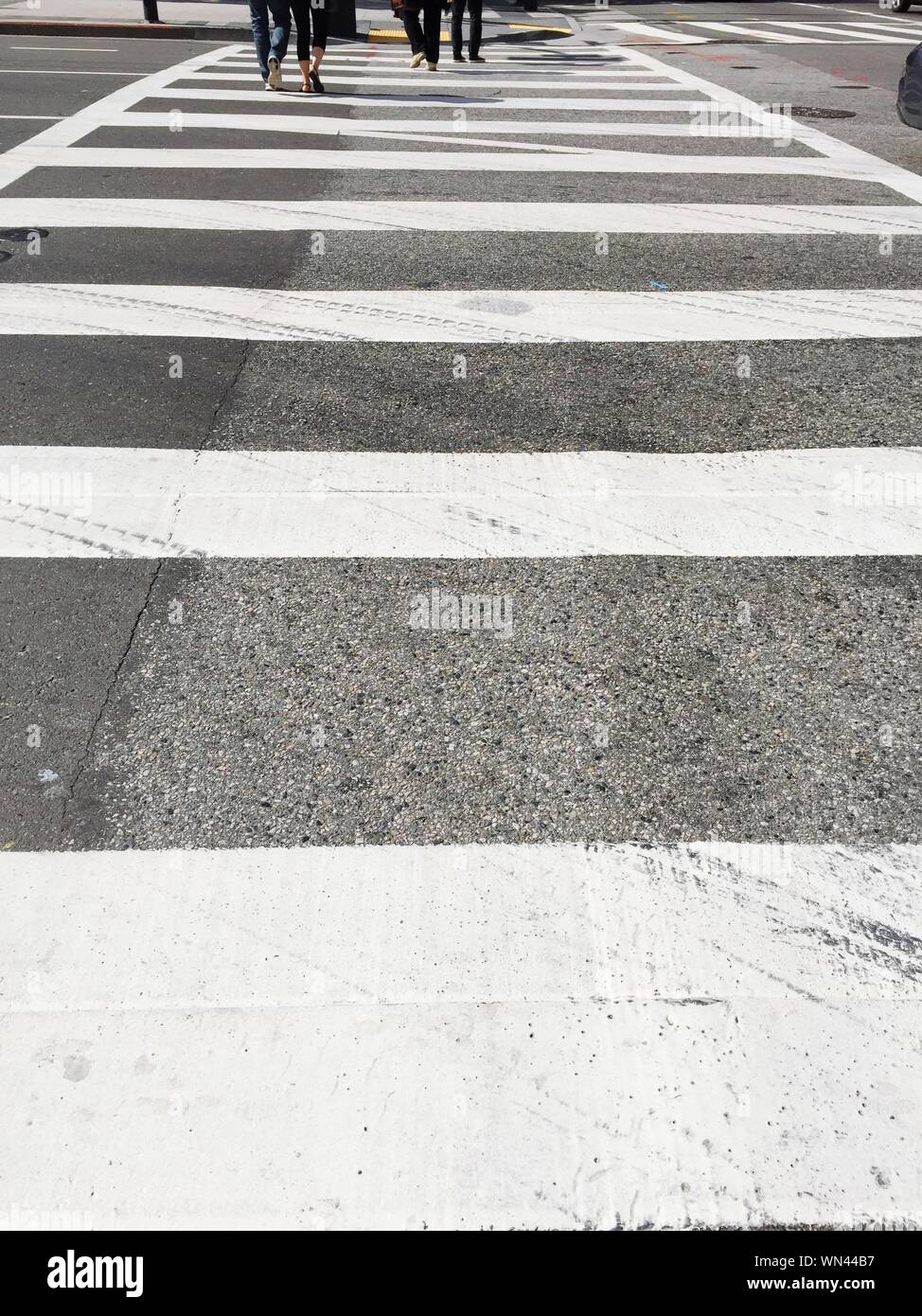 People walking on zebra crossing hi-res stock photography and images ...